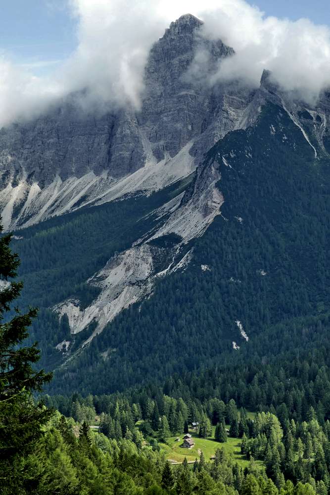 The mighty Sassolungo of Cibiana viewed descending from Monte Rite ...