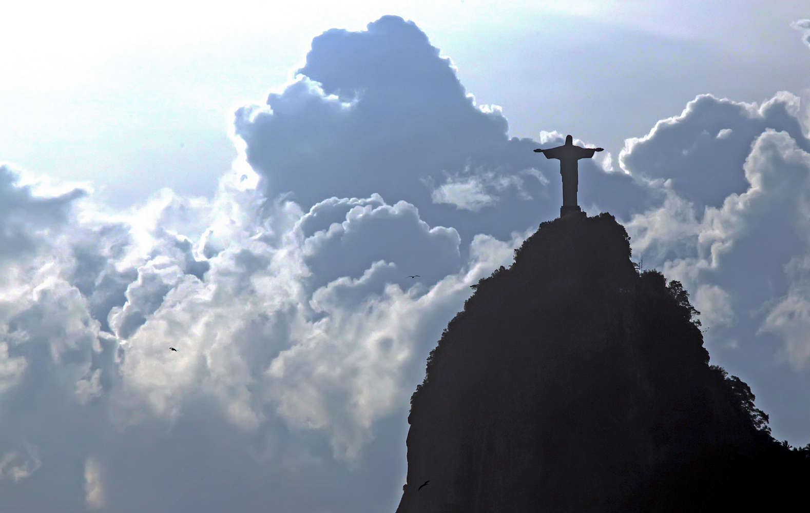 Corcovado Rock in Rio de Janeiro and the famous statue of Christ ...