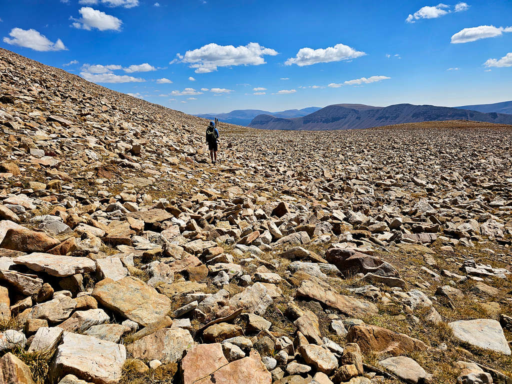 Traversing the slopes of Dome Peak, Val Benchmark seen : Photos ...